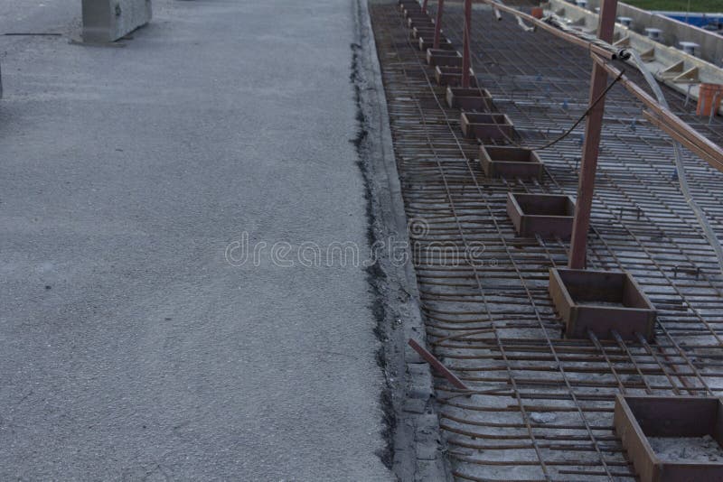 A Grid of Reinforcement Laid on the Surface Ready for Pouring Concrete ...