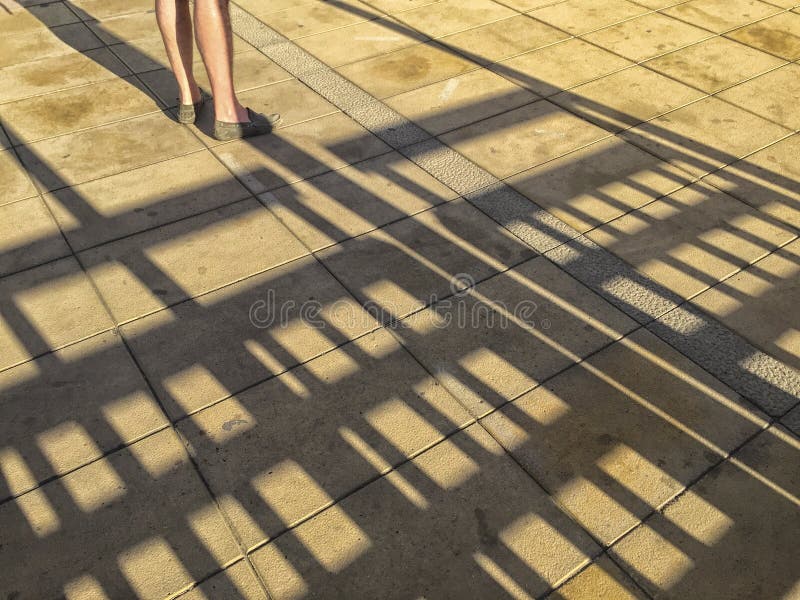 Grid in sun and shadow stock image. Image of floor, pavilion - 90213569