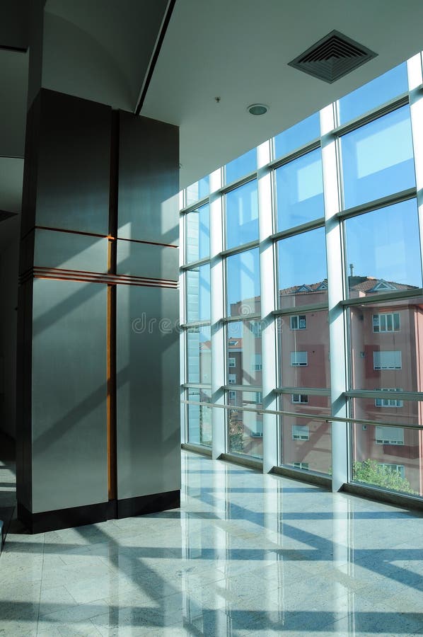 Grid Windows and Stylized Column Stock Photo - Image of light, column ...