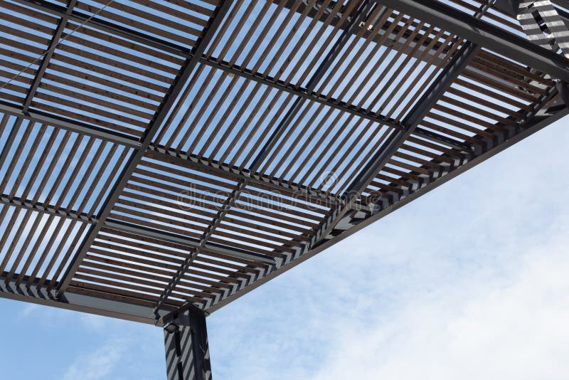 Gridded Architectural Shade Structure of Wood Slats on a Metal Frame ...