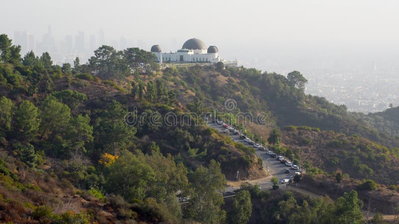Griffith Observatory with Parked Cars and Downtown Silhouettes Stock ...