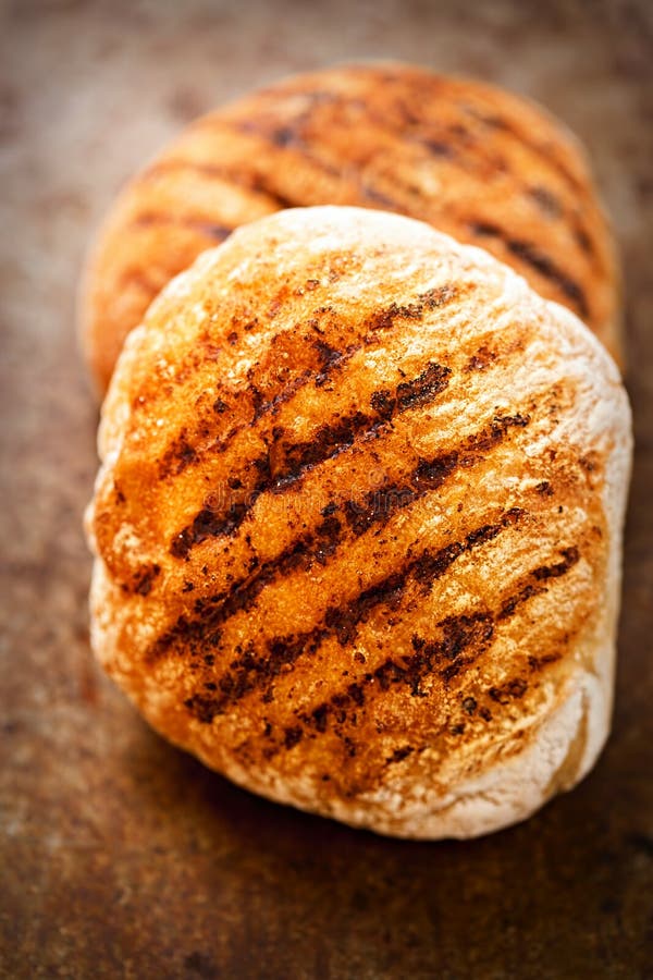 Grill Burger Bun with Grill Marks Stock Image - Image of brown, grilled ...