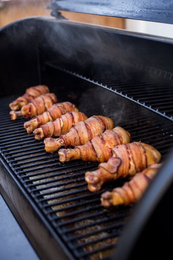Grill with Chicken Legs Wrapped in Bacon Stock Image - Image of dinner ...