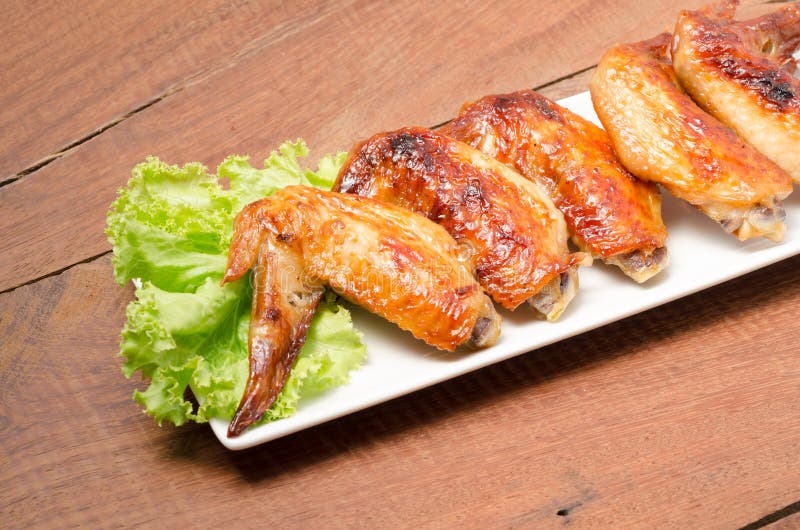 Grill chicken wings close stock image. Image of closeup - 33008357