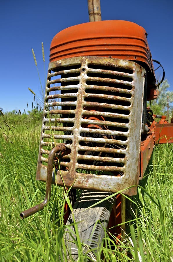 Grill and Crank of an Old Tractor Stock Photo - Image of abandoned ...