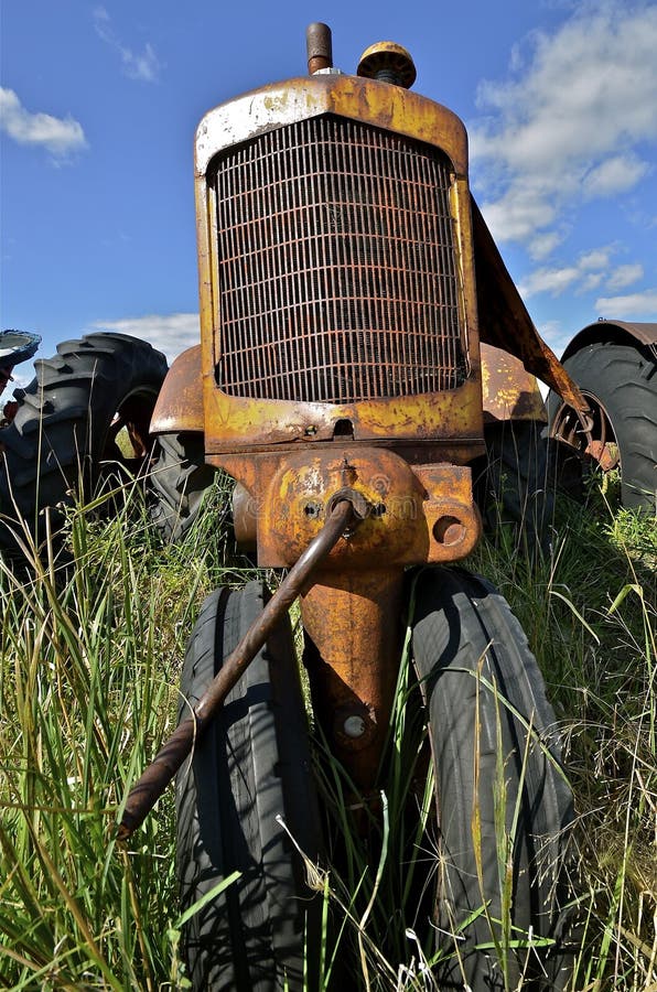 Grill and Crank of an Old Tractor Stock Photo - Image of abandoned ...