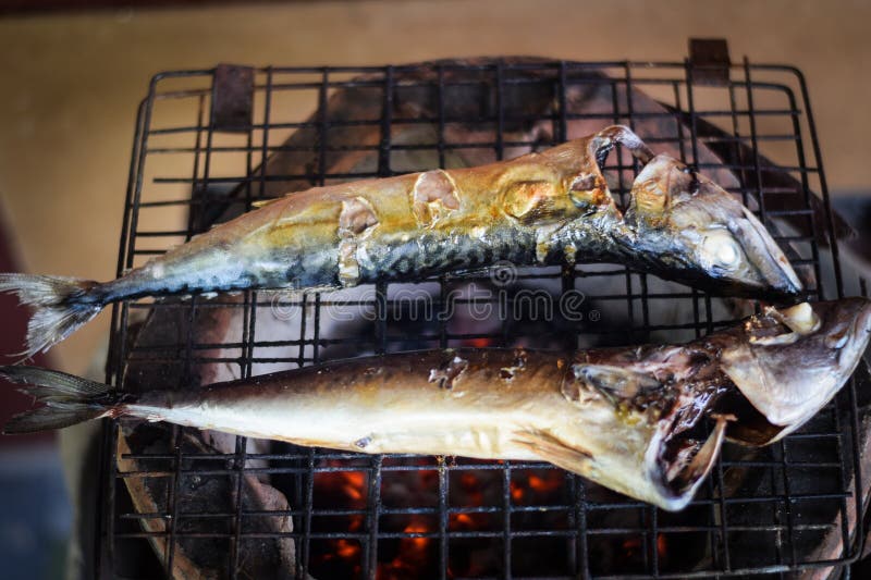 Grill Fish with Fire and Smoke Stock Photo - Image of fish, dish: 275066814