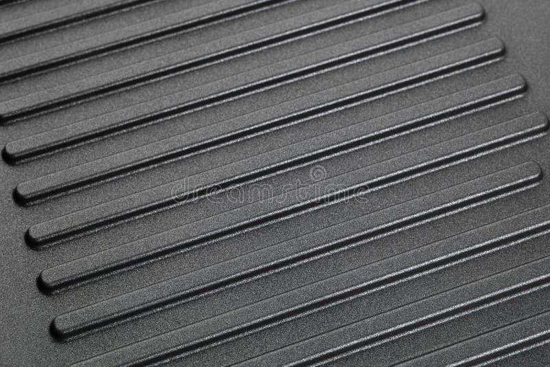 Grill Pan Surface Close Up. Ribbed Surface of a New Frying Pan Stock ...
