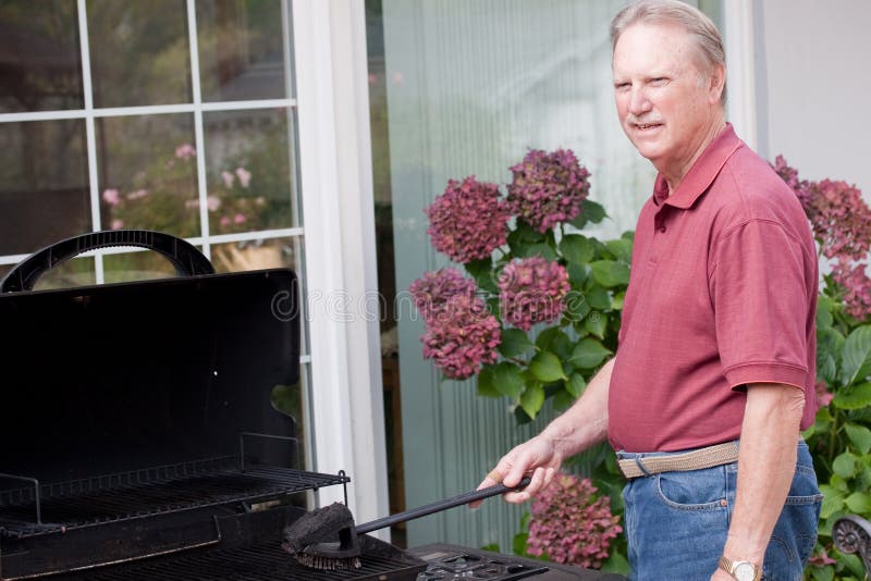 Cute Guy Smiling and Cooking on the Barbecue Grill Stock Image - Image ...