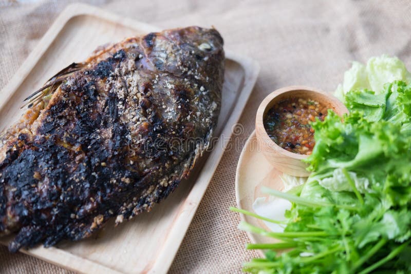 Grill Salt Tilapia Fish with Vegetable Stock Image - Image of sardines ...