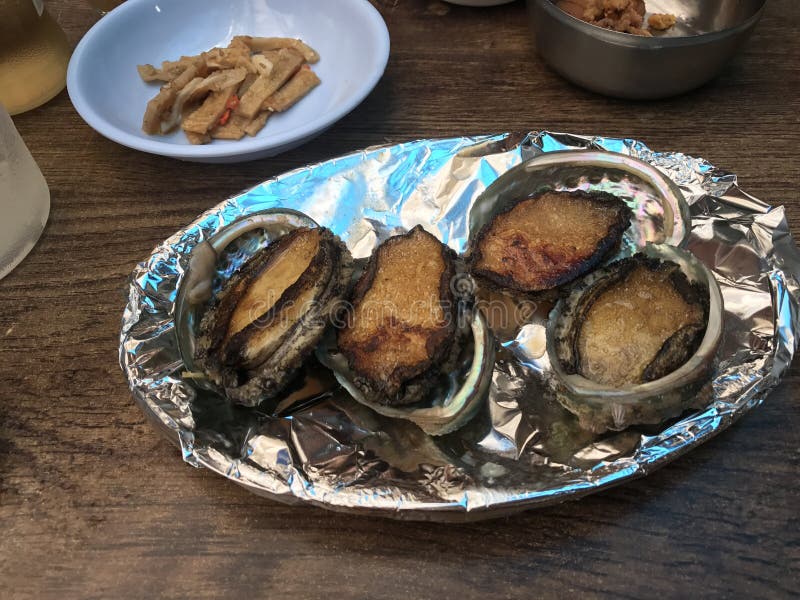 Grilled abalone:& x29; stock photo. Image of tasty - 102926488