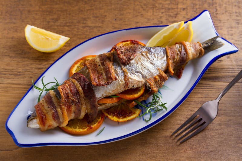 Grilled Bacon-Wrapped Whitefish. Fish Wrapped with Bacon. Stock Photo ...