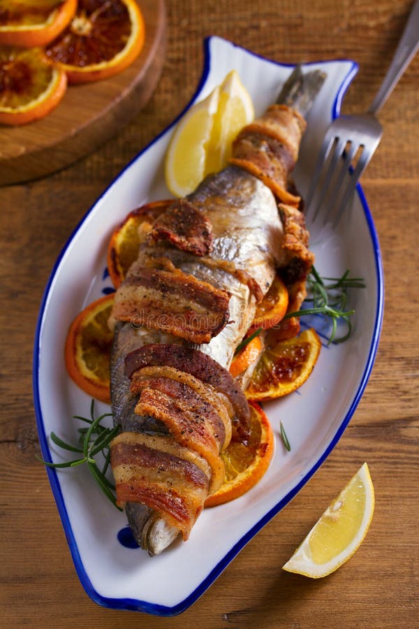 Grilled Bacon-Wrapped Whitefish. Fish Wrapped with Bacon. Stock Photo ...