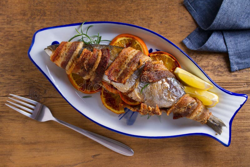 Grilled Bacon-Wrapped Whitefish. Fish Wrapped with Bacon Stock Image ...