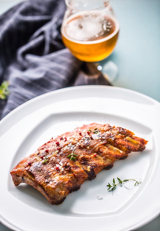Grilled Barbecue Pork Ribs in a White Plate As Menu in Pub. Stock Image ...