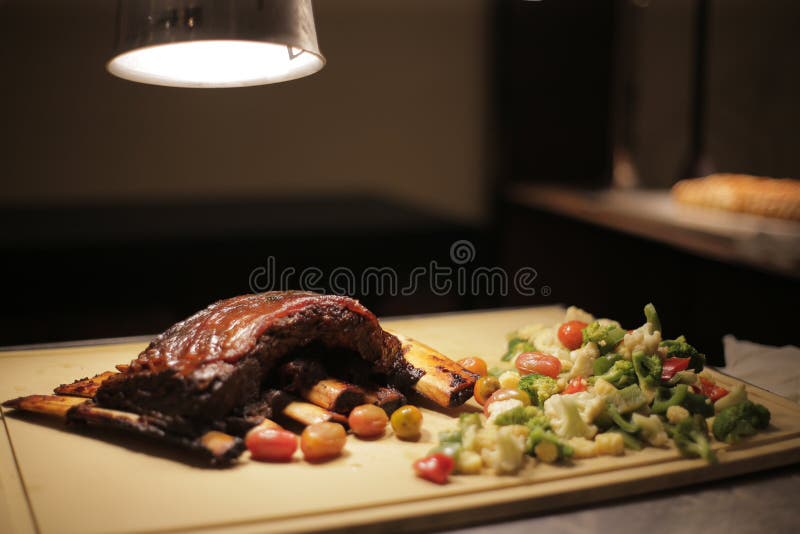 Grilled Barbeque Beef Under Heating Lamp Stock Image - Image of ...