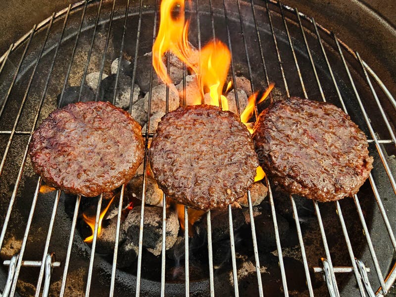 Grilled beef burger stock photo. Image of flame, burger - 336218112