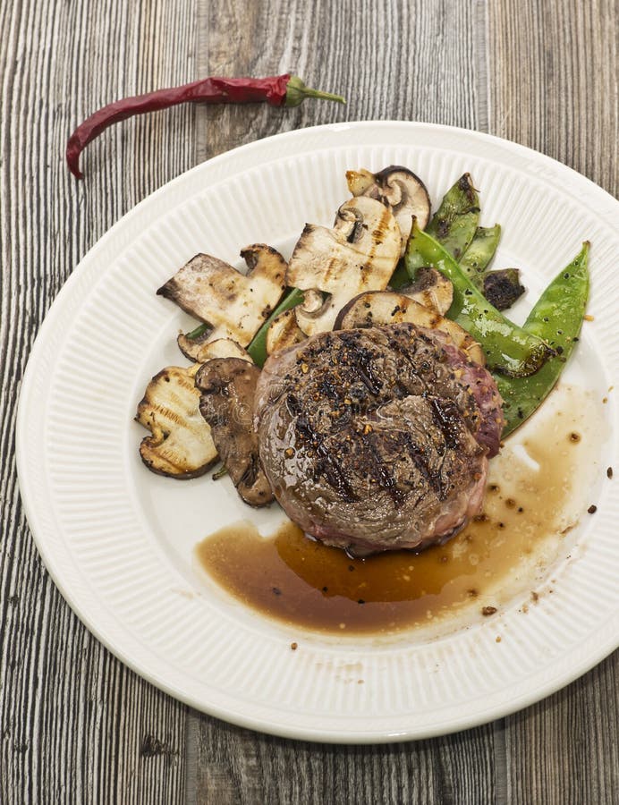 Grilled Steak with Mushrooms and Snow Peas Stock Photo - Image of ...