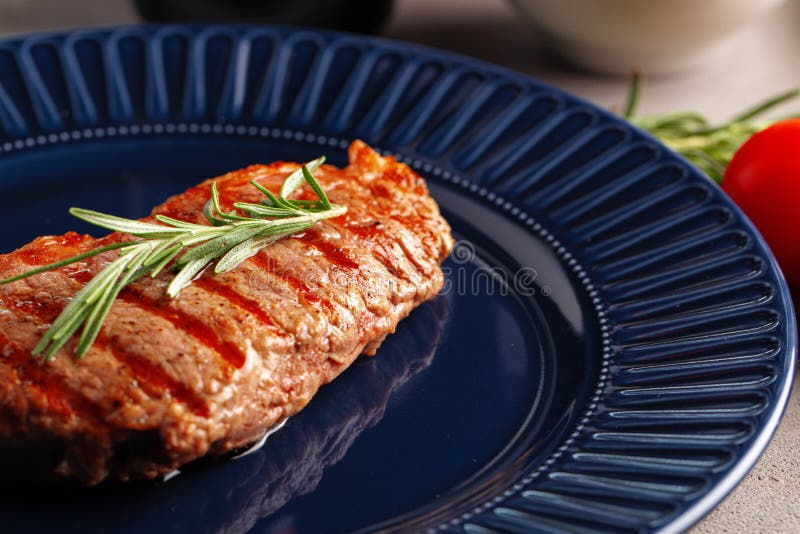 Grilled Beef Steak Served on Blue Plate Stock Image - Image of juicy ...