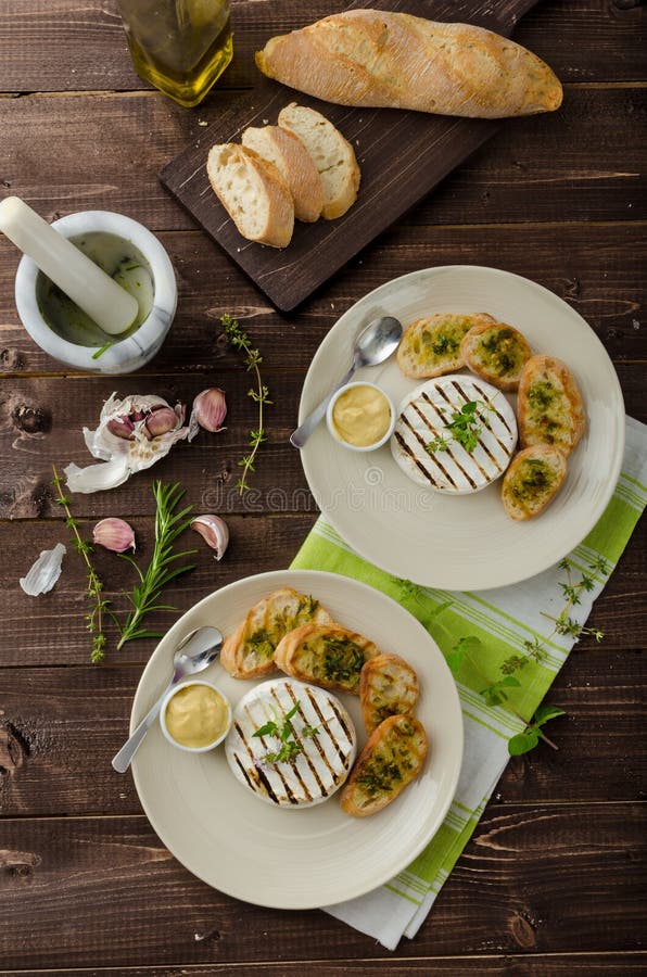 Grilled Camembert with Mini Herbs Baguettes Stock Photo - Image of ...