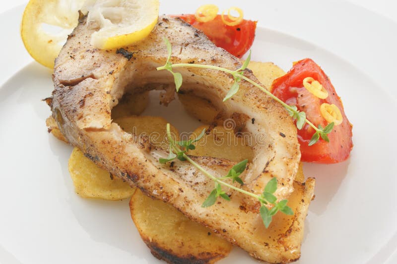 Grilled Carp Fillet on Potato with Lemon Stock Image - Image of health ...