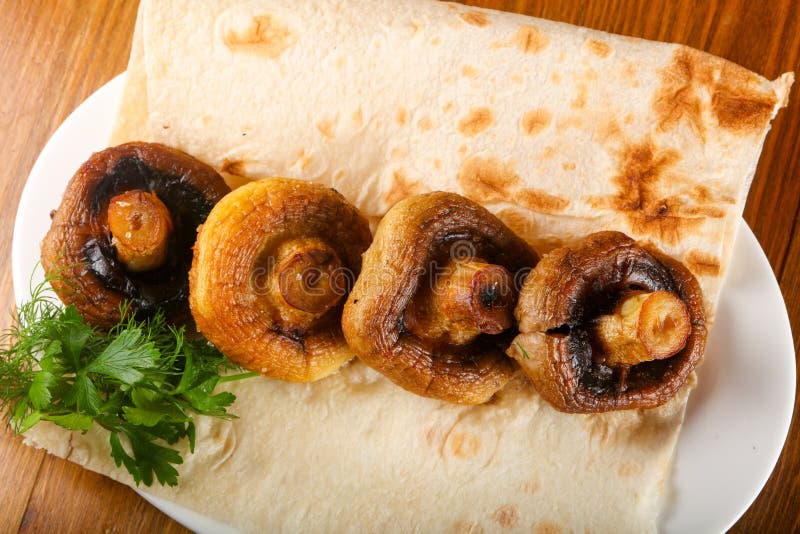 Grilled champignons stock photo. Image of organic, portobello - 112181380