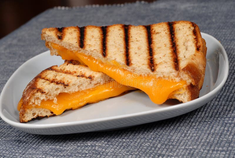 Grilled Cheese Sandwich on a Blue Plate Stock Photo - Image of plate ...