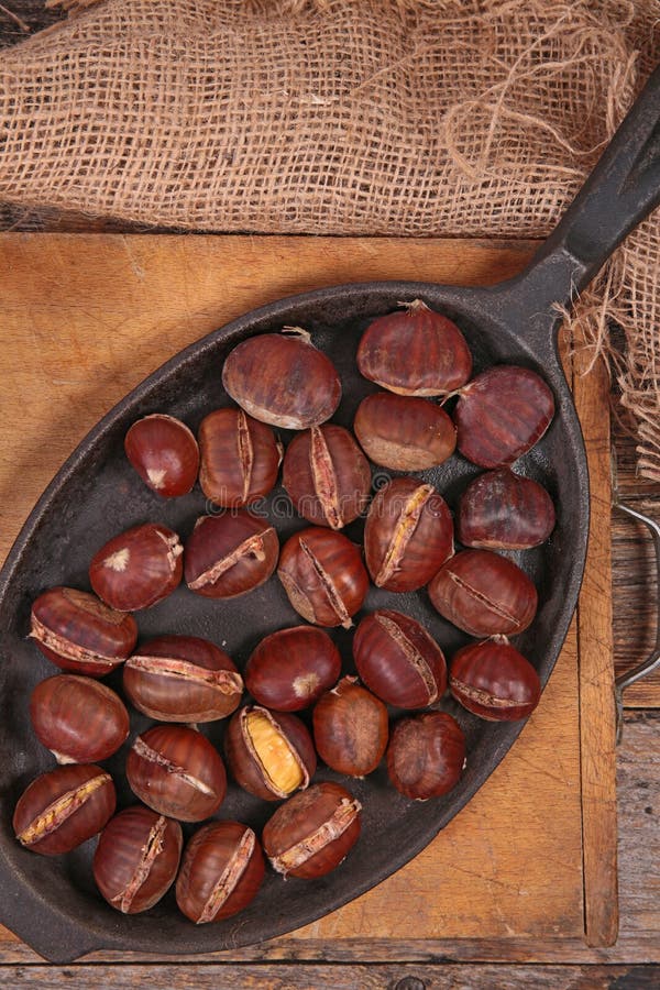 Grilled chestnut on pan stock image. Image of dinner - 126103197