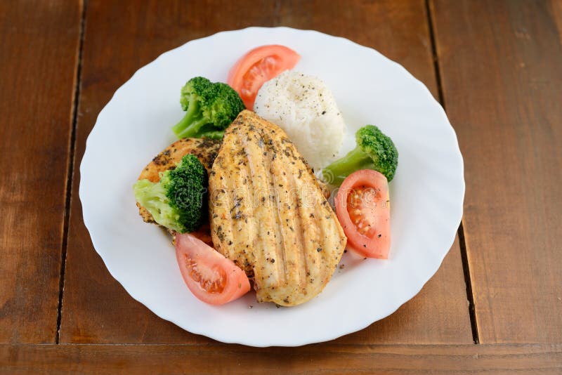 Grilled Chicken Breast with Rice and Vegetables Stock Photo - Image of ...