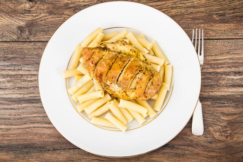 Grilled Chicken Fillet with Pasta Stock Image - Image of lunch, bows ...
