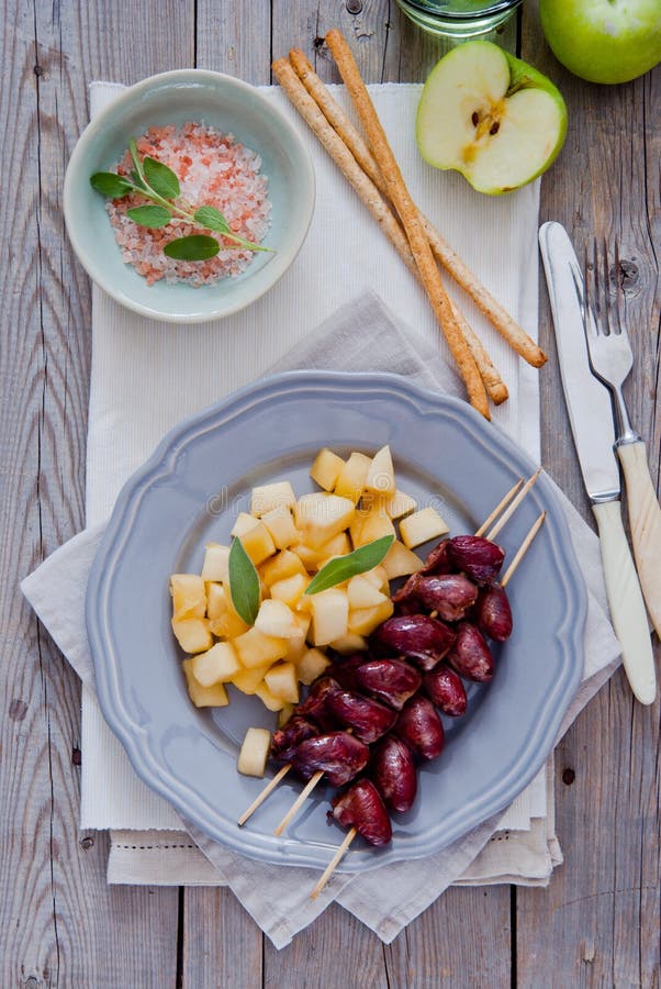 Grilled Chicken Hearts on Skewers with Stewed Apples Stock Photo ...