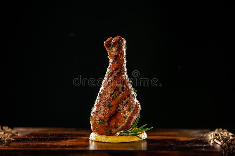 Grilled Chicken Leg on a Decorative Presentation Stock Photo - Image of ...