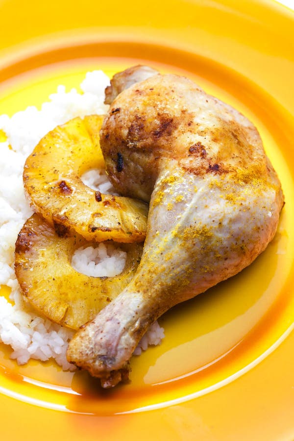 Grilled Chicken Leg Served with Fried Pineapple Slices and Rice Stock ...