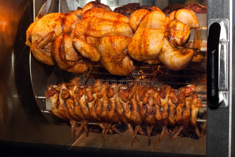Grilled chicken machine stock photo. Image of skin, chicken - 81417446