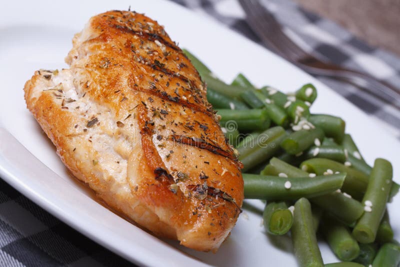 Grilled Chicken Meat with Green Beans on a White Plate Stock Photo ...