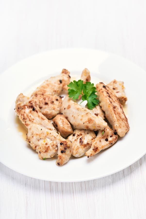 Grilled Chicken Meat Sliced on White Plate Stock Photo - Image of diet ...
