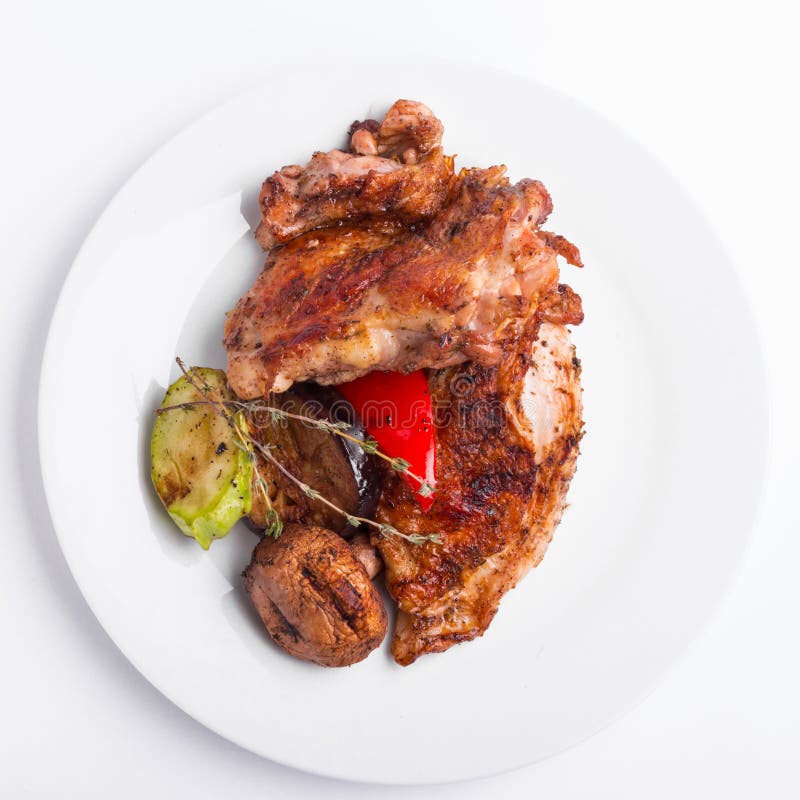 Grilled Chicken Steak and Vegetables on a White Background Stock Image ...