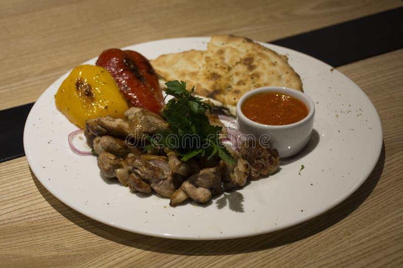 Grilled Chicken with Vegetables, Adjika and Bread Stock Photo - Image ...