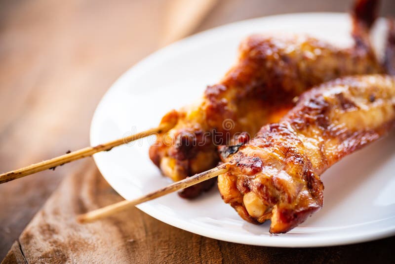 Grilled Chicken Wing with Bamboo Stick Stock Image - Image of brown ...