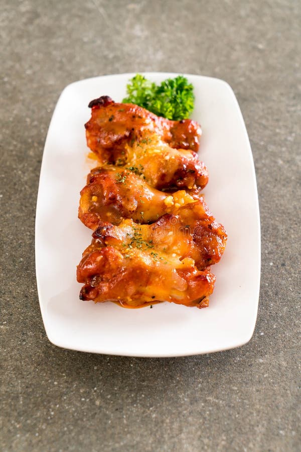 Grilled Chicken Wings with Cheese Stock Photo - Image of blue, plate ...