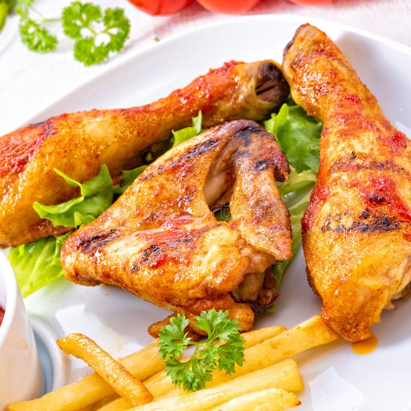 Grilled Chicken Wings,legs,chips and Vegetables Stock Photo - Image of ...