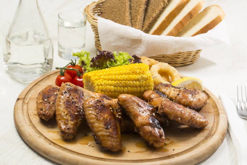 Grilled Chicken Wings with Sweet Corn. Stock Photo - Image of meat ...