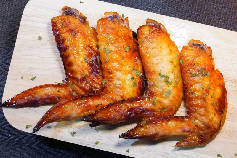Grilled Chicken Wings on a Wooden Board Stock Photo - Image of gourmet ...