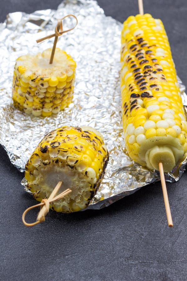 Grilled Chopped Corn on Skewers on Foil Stock Image - Image of pepper ...