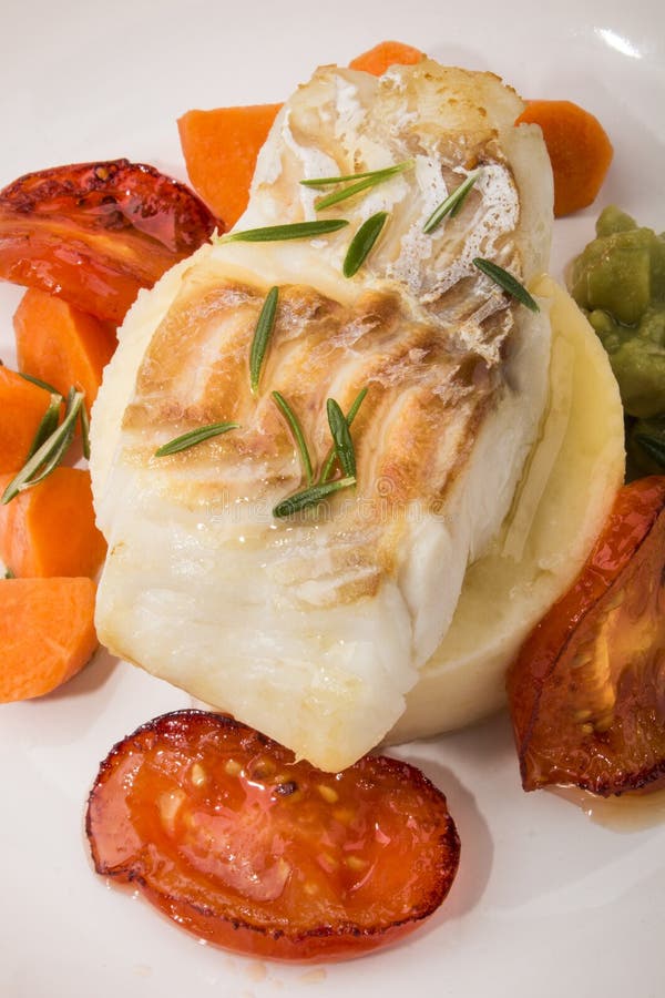 Grilled Cod with Mashed Potato, Carrots, Tomato and Mushy Pea Stock ...