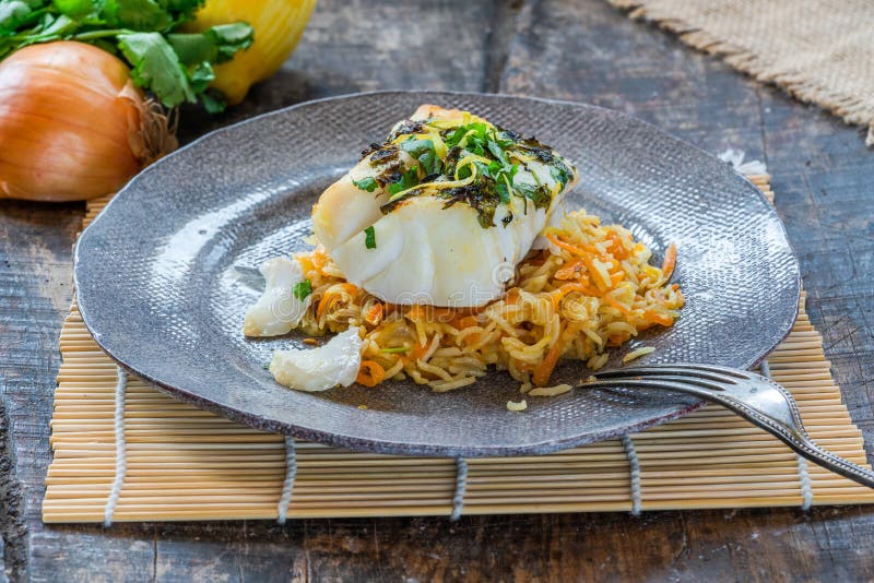 Grilled Coriander and Lemon Cod with Carrot Pilaf Stock Photo - Image ...