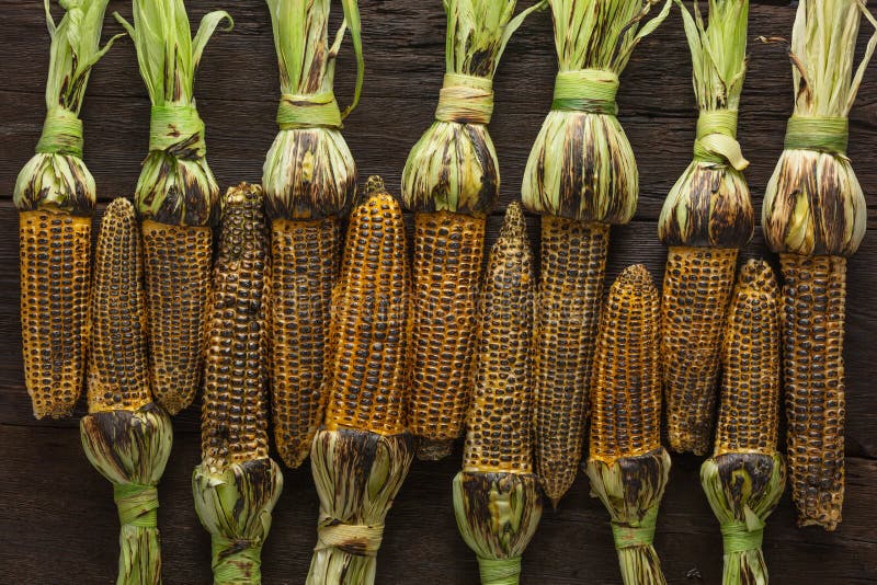 Grilled Corn, Top View, Heap of Grilled Corn on a Wooden Table Stock ...