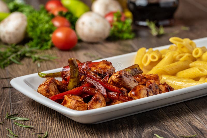 Grilled cubed chicken stock photo. Image of pasta, closeup - 183836068