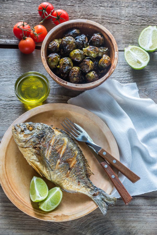 Grilled Dorade Royale Fish with Fresh and Baked Vegetables Stock Image ...