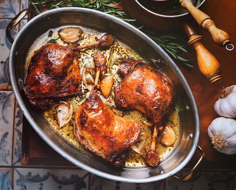 Grilled duck with garlic stock image. Image of baking - 303283551